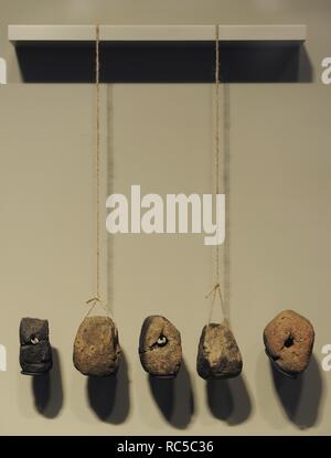 Roman era. Loom weight. Clay. Archaeological Museum of Seville. Spain ...