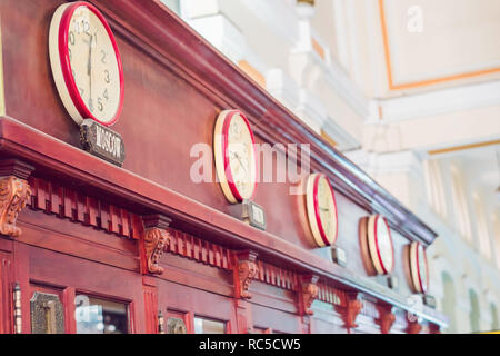 Clocks showing various world city times outside the Tourneau Store ...