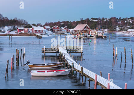 Pier in harbor covered with snow Stock Photo - Alamy