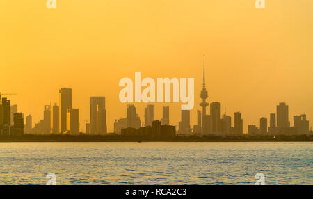 The skyline of Kuwait City at sunset, Kuwait Stock Photo - Alamy