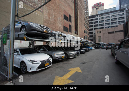 Car stack parking in New York saves space but can take longer to Stock ...
