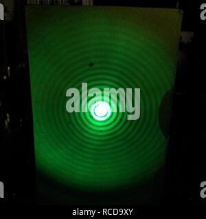 Airy disk created by laser beam through pinhole Stock Photo - Alamy