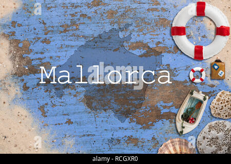 Maritime decoration and the shape of the island "Mallorca" on blue ...