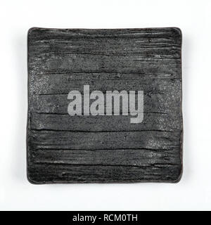 One Black Modern Square Stoneware Ceramic Plate Stock Photo - Alamy