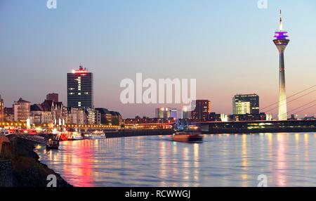 Evening scenery on the Rhine, Rheinturm tv tower, Rheinkniebruecke ...