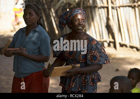 Indigenous Jola tribe women play traditional musical instruments and ...