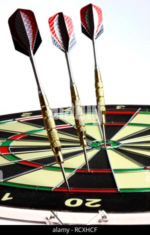 dartboard with darts Stock Photo - Alamy
