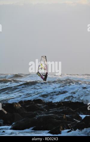 UK Walney Island Cumbria. Windsurfers stormy weather Furness Peninsula ...