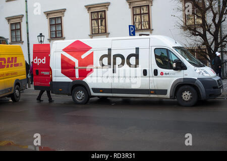 DHL express parcel delivery van and driver in yellow van a division of ...