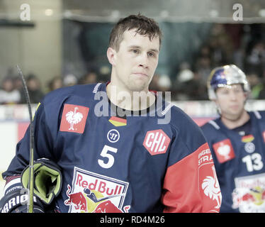 Keith Aulie of Red Bull Munich punched Louis-Marc Aubry of Eisbaeren ...