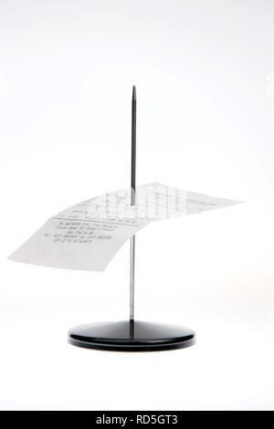 Spike file, note spike, steel needle with receipts and vouchers Stock ...