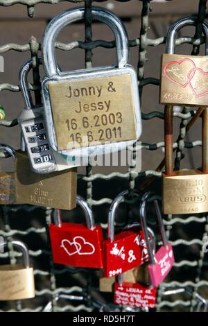 A closeup of hanging love locks on bridge in Frankfurt Stock Photo - Alamy