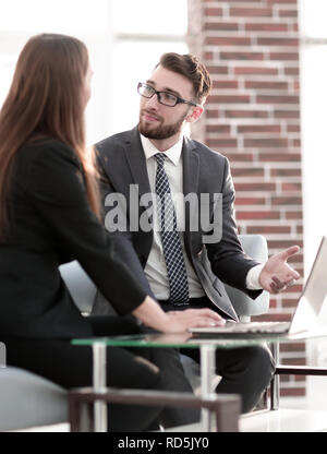 Coworking, Creative manager showing new startup idea Stock Photo - Alamy
