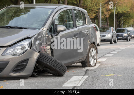damaged grey car after accident Stock Photo - Alamy