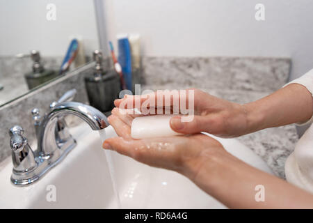 Young Caucasian Female Hands Lathering White Bar Hand Soap for Washing ...