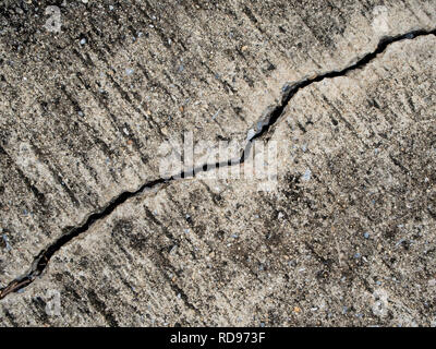 Cracked and separated on concrete floor Stock Photo - Alamy
