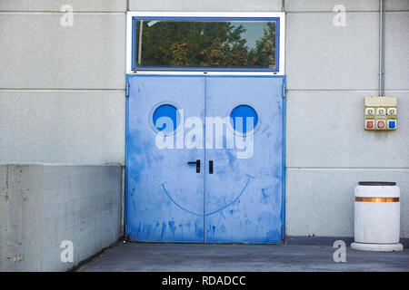 External factory wall with Health & Safety forklift truck and personnel ...