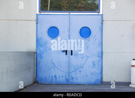 External factory wall with Health & Safety forklift truck and personnel ...
