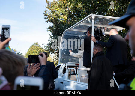 Pope Francis arrives on his popemobile to attend an open-air general ...