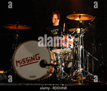Andy Nicholson, bass guitar with the Arctic Monkeys performs on stage ...