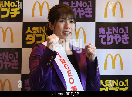 TOKYO, Japan - Saori Yoshida of Japan smiles with a medal after winning ...