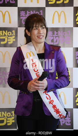 TOKYO, Japan - Saori Yoshida of Japan smiles with a medal after winning ...