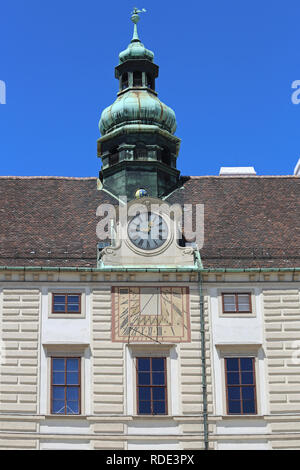Sundial and Public Clock at Building in Vienna Stock Photo - Alamy