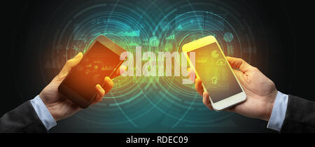Close up of two smartphones syncing business data Stock Photo - Alamy