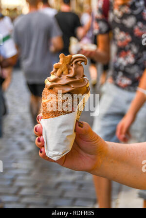 Chimney cake with ice cream in Prague, Czech Republic Stock Photo - Alamy