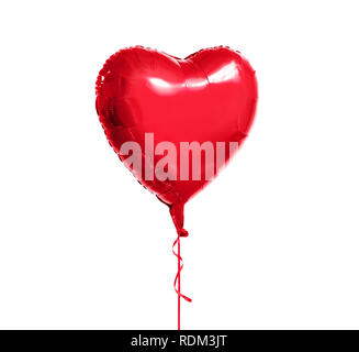 Heart shaped red inflatable balloon Stock Photo - Alamy