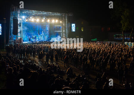 Music festival crowd. Heavy metal music festival crowd watching with ...