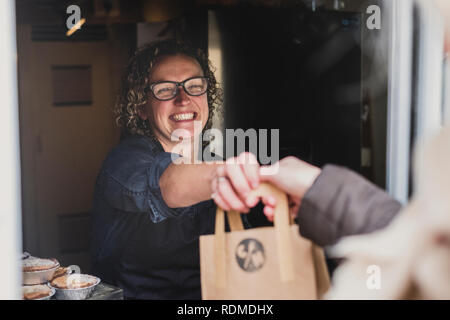 cheerful woman wearing glasses made of gold coins cryptocurrency ...