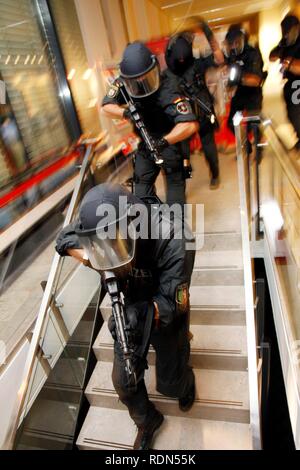 Police exercise. Bank robbery. Bank robber with a gun takes hostages in ...