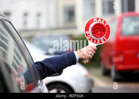 Unmarked police car, police officer stopping a vehicle with a ...