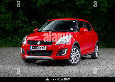 2013 Suzuki Swift 4x4 - 4 wheel drive compact car Stock Photo - Alamy