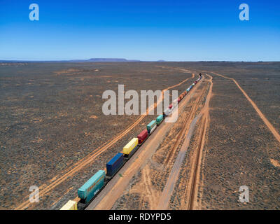 Aerial of freight train heading for Darwin just outside of Port Augusta ...