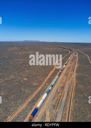 Aerial of freight train heading for Darwin just outside of Port Augusta ...