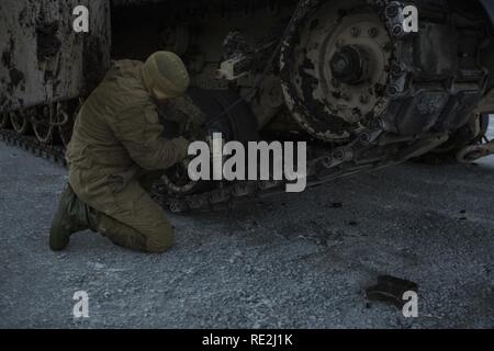 U.S. Marines install cleats on M1A1 Abrams tanks in Setermoen, Norway ...