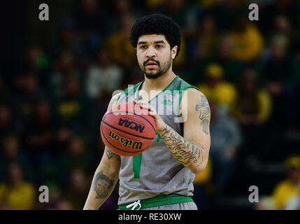 North Dakota Fighting Hawks guard Eli King (2) attempts to shoot over ...