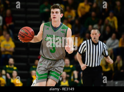 North Dakota Fighting Hawks guard Tyree Ihenacho (4) goes up for a shot ...