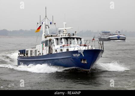 Boat of the water police patrolling on the Rhine river at Duisburg ...