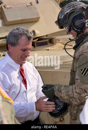 Pfc. Jon Scrip, an armor crewmember with Company C, 3rd Battalion, 69th ...