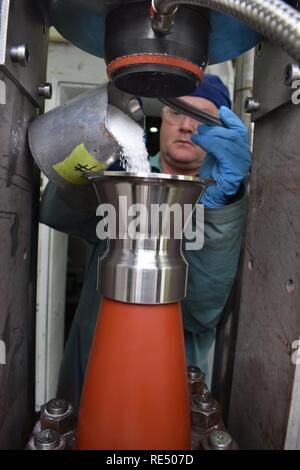 A Crane Army Ammunition Activity explosives handler displays a warning ...