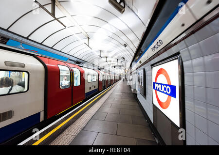 Underground train at the Pimlico station on the Victoria line, London ...