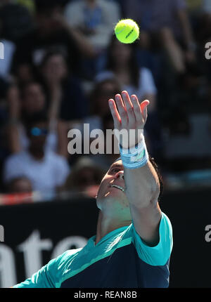Milos Raonic of Canada prepares to serve to Stan Wawrinka of ...