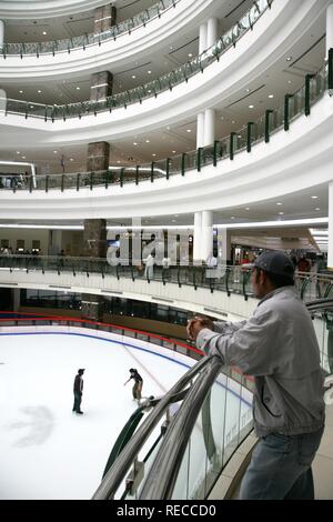 Qatar, Doha, ice skating in an elegant shopping center of the city ...