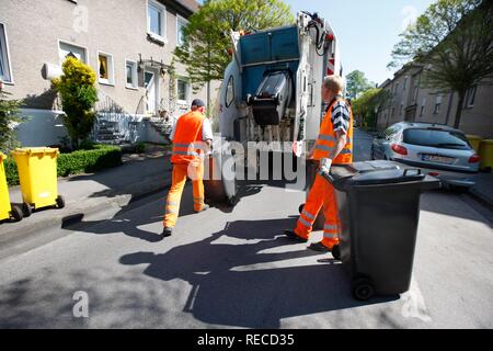 Germany, garbage collection, men, bins, emptying, garbage truck, detail ...