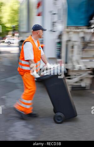 Germany, garbage collection, men, bins, emptying, garbage truck, detail ...