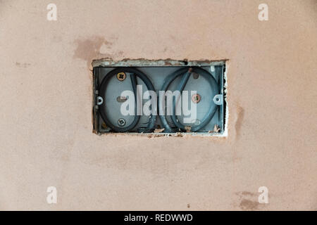 First fix domestic electrics in a freshly plastered wall Stock Photo ...