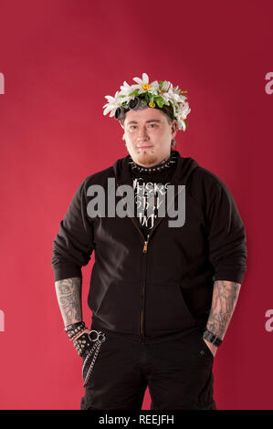 Man wearing flower wreath Stock Photo - Alamy